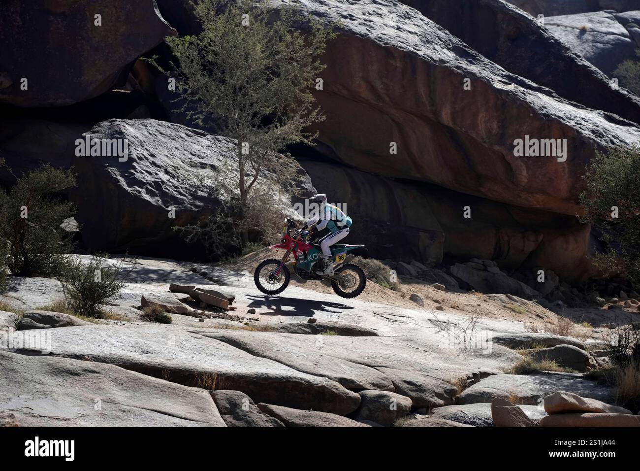 Mason Klein rides during stage one of the Dakar Rally with start and ...