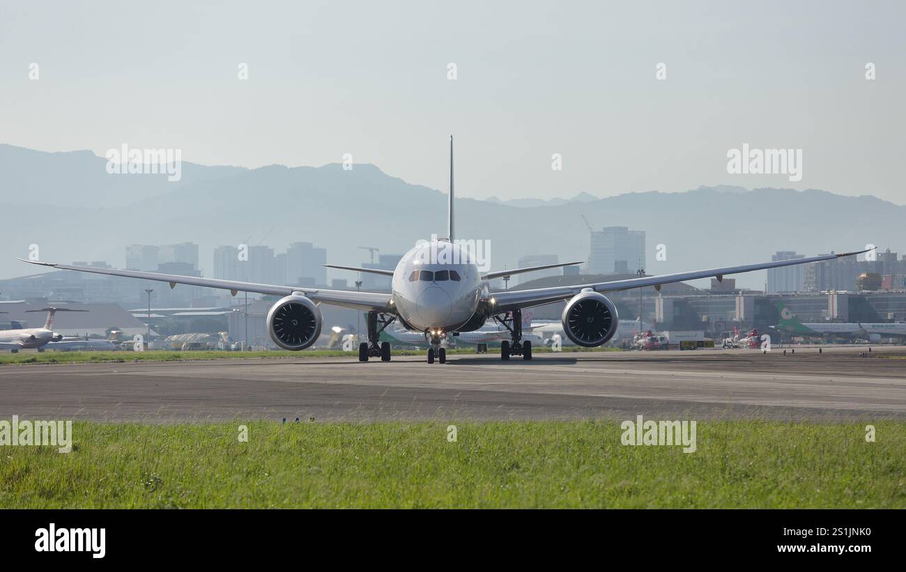 EVA Air Boeing 787-10 Dreamliner on the runway is going to take off from Taipei Songshan Airport ...
