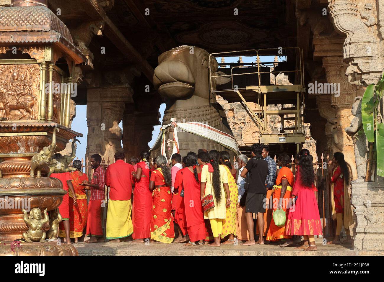 Pilgrims at the Nandi mandapam in the Brihadisvara Temple in Thanjavur ...