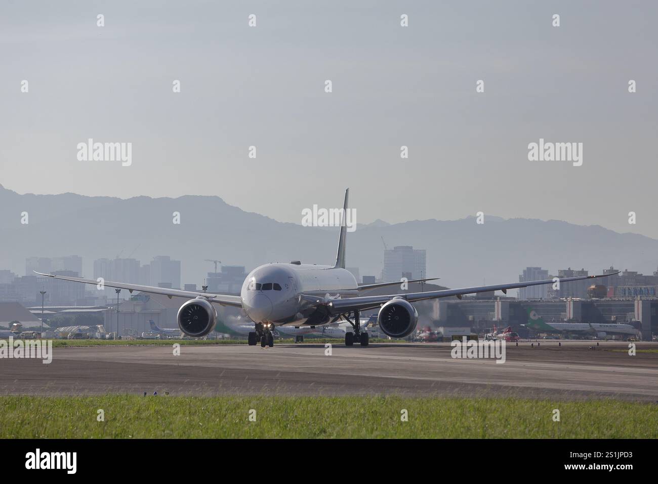 EVA Air Boeing 787-10 Dreamliner on the runway is going to take off from Taipei Songshan Airport ...
