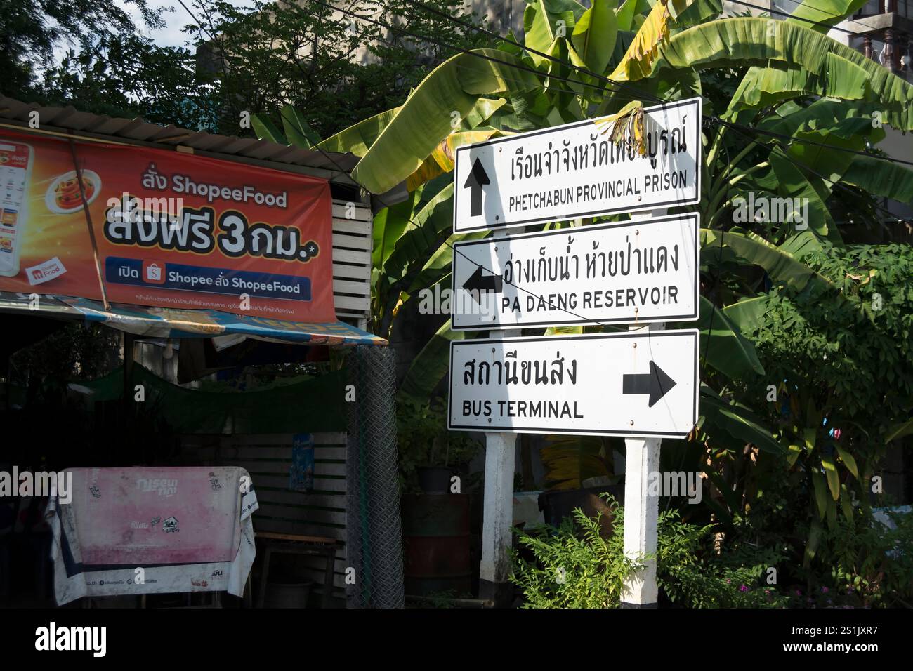 bilingual direction signs, in thai and english, in phetchabun, thailand ...