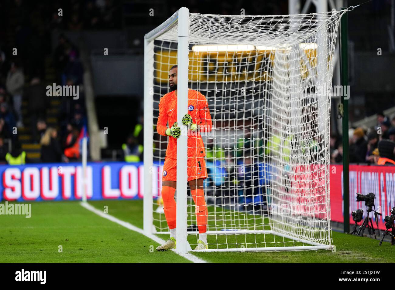 Chelsea's goalkeeper Robert Sanchez stands between the posts before the ...