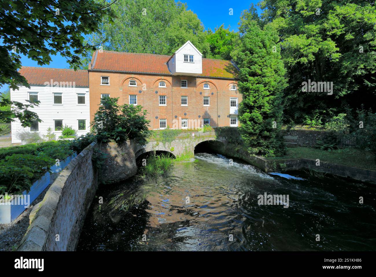 View of Narborough Mill, river Nar, Narborough village, North Norfolk ...