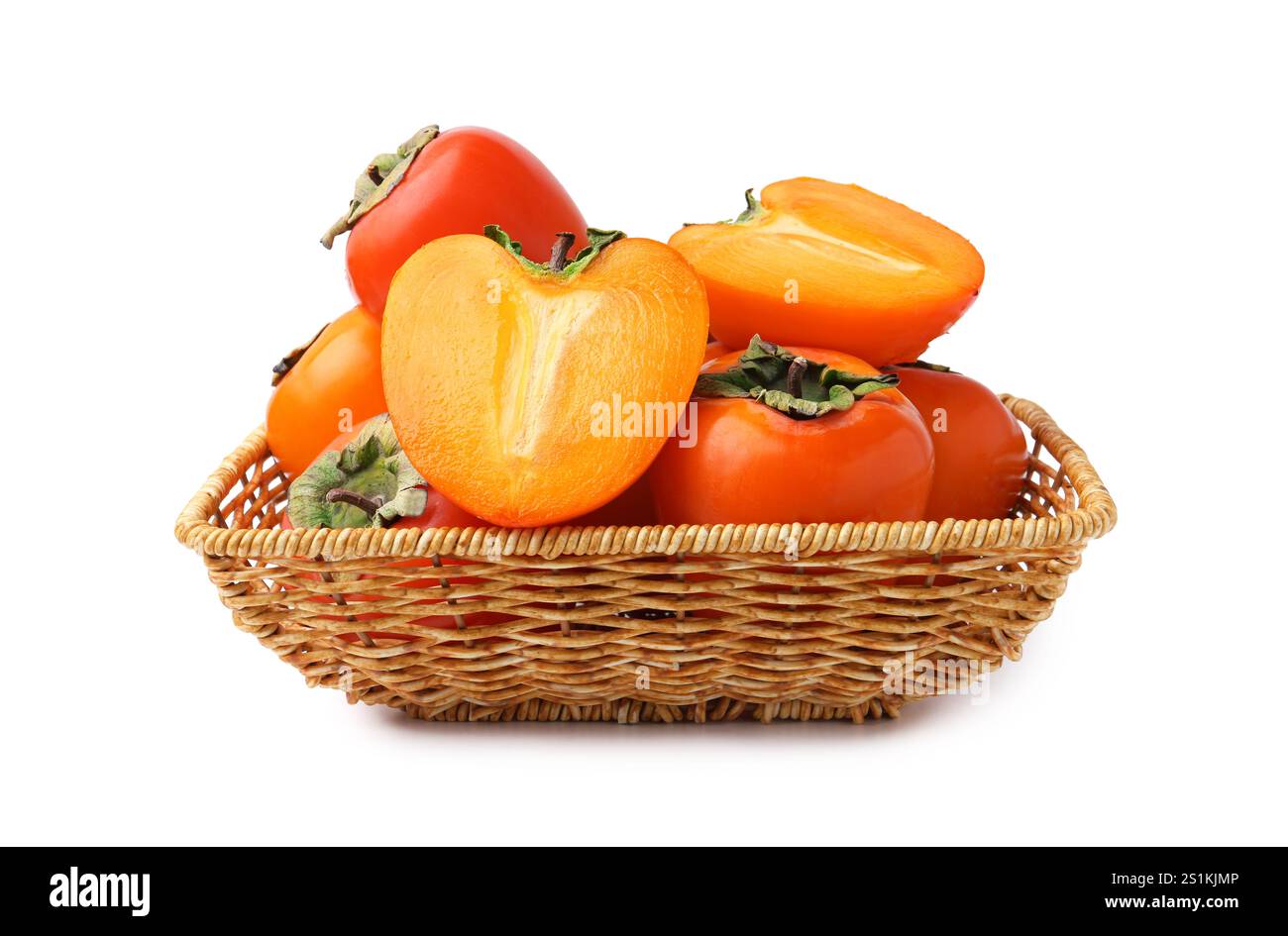 Delicious fresh juicy persimmons in wicker basket isolated on white ...