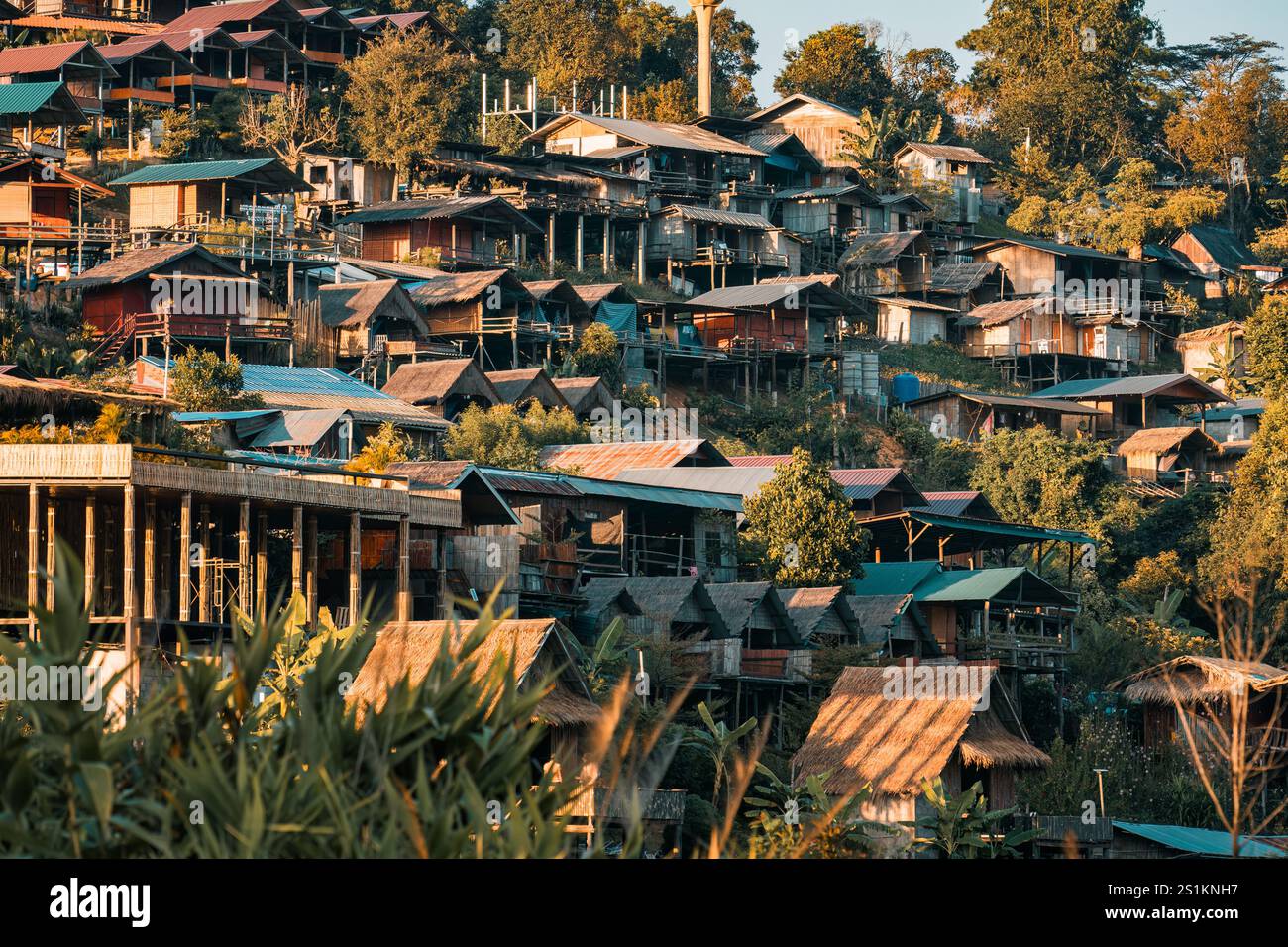 Rustic traditional village on hillside of local community in the valley on countryside at Ban Na ...