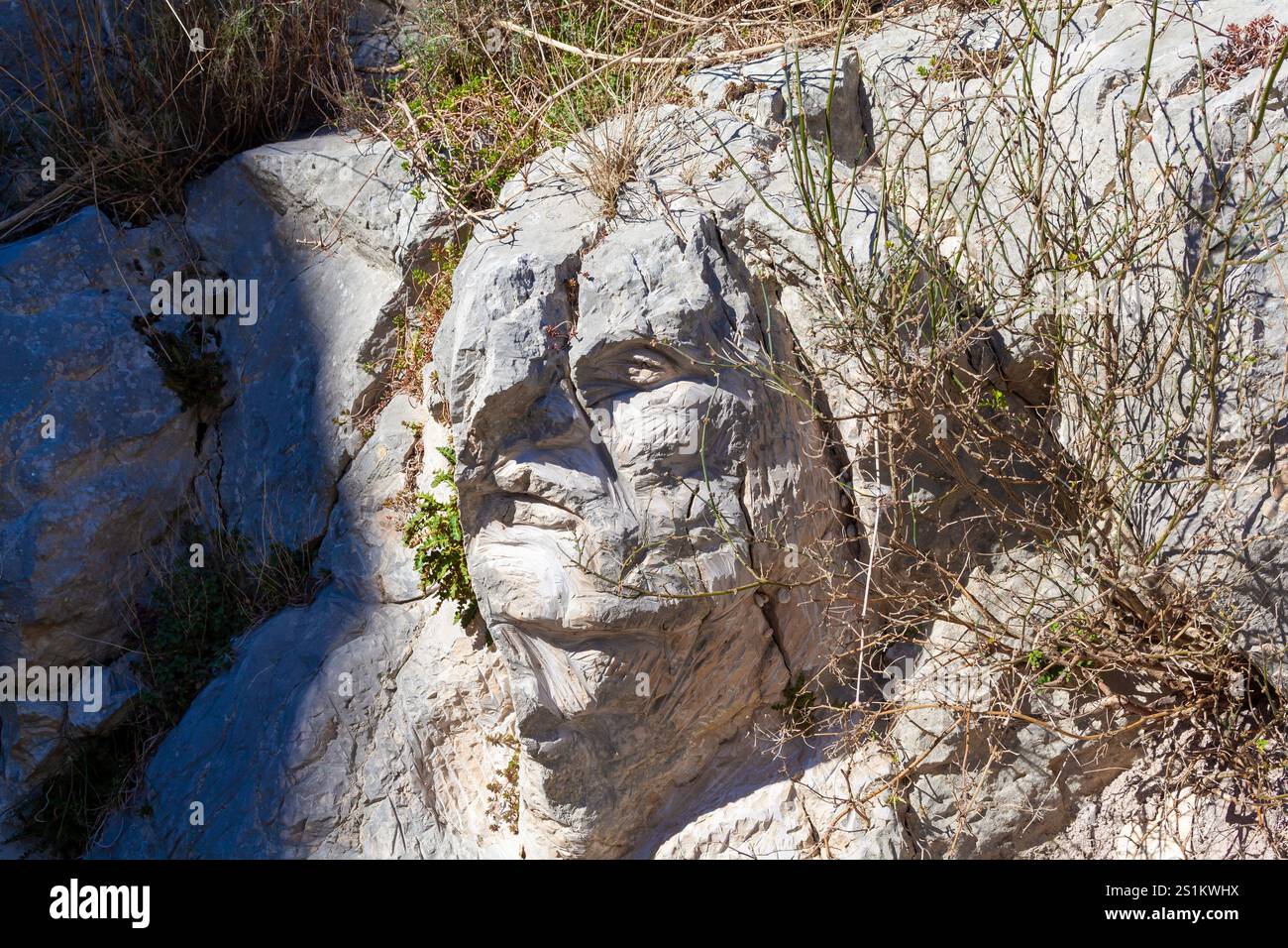 Natural rock sculpture depicting human face in Cervara di Roma Stock ...