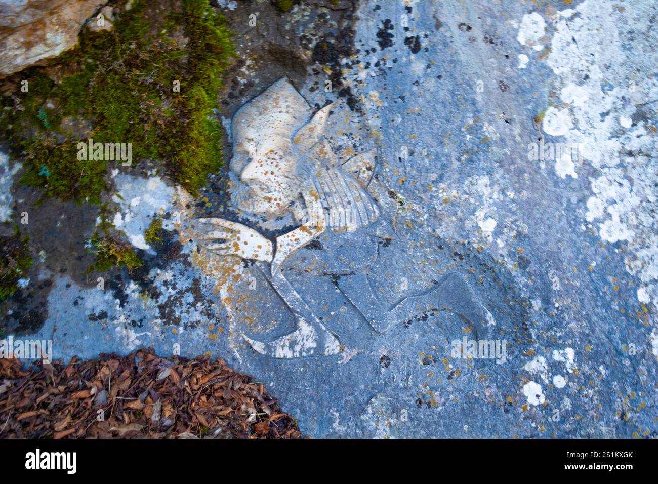 Ancient elf figure carved in natural rock at Cervara di Roma Stock ...
