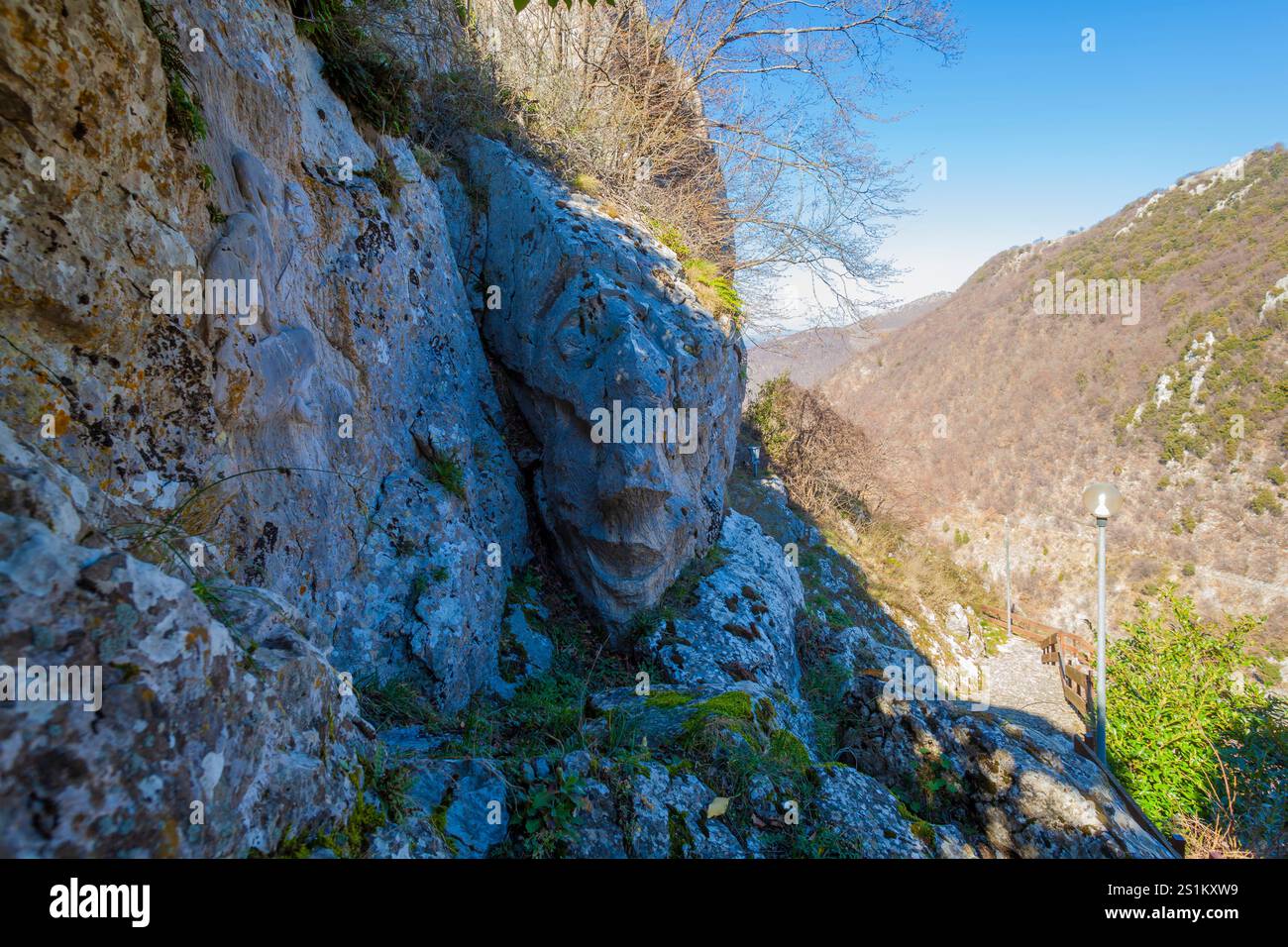 Scenic hillside carving of human face in Cervara di Roma Stock Photo ...