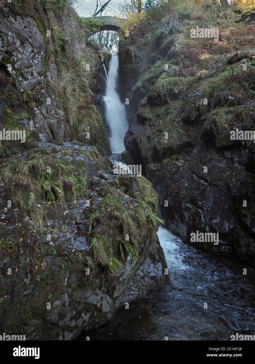 Water cascading down Aira Force waterfall, near Ullswater, Lake ...