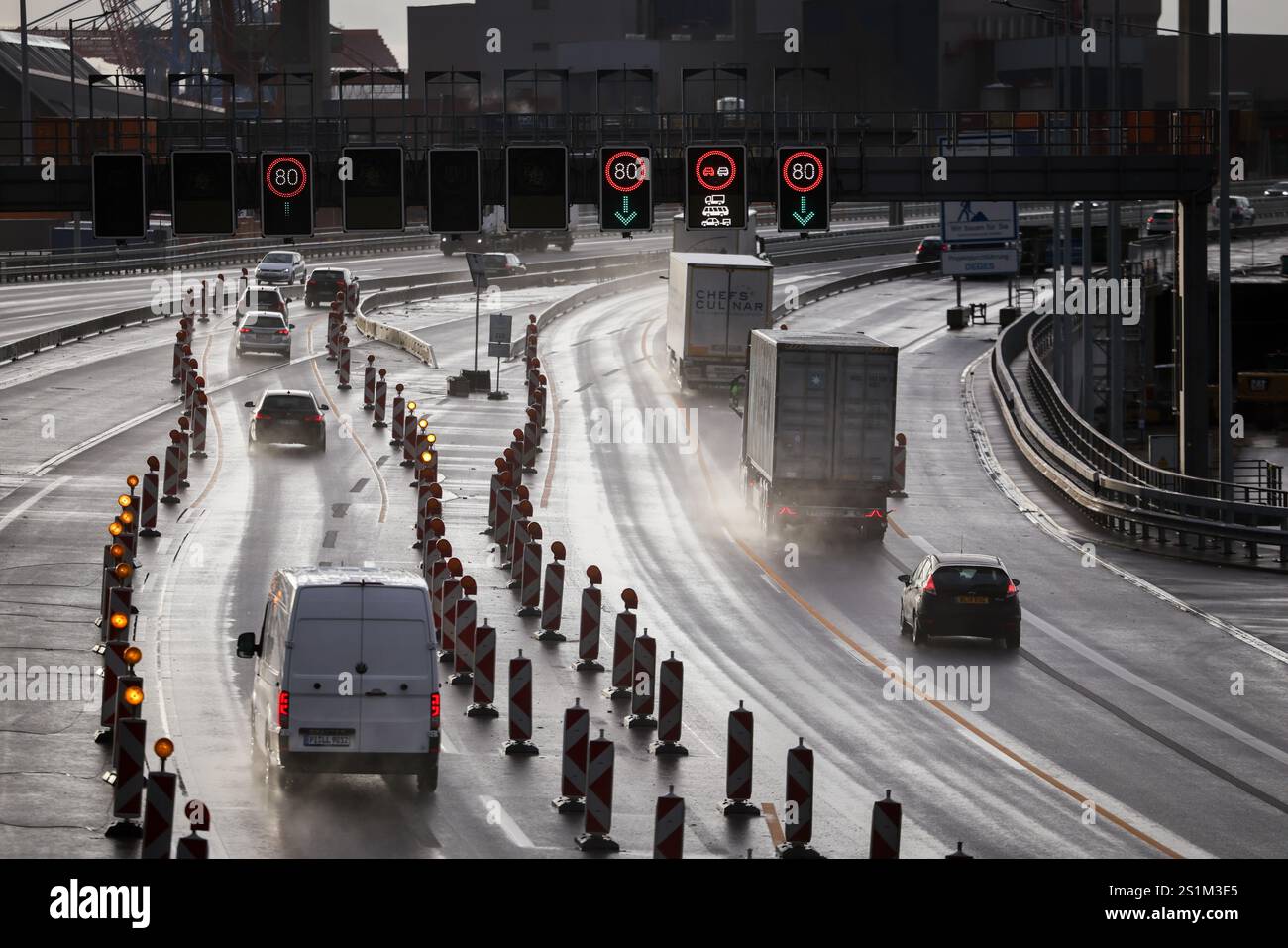 Hamburg, Germany. 03rd Jan, 2024. Vehicles drive on the A7 highway in ...