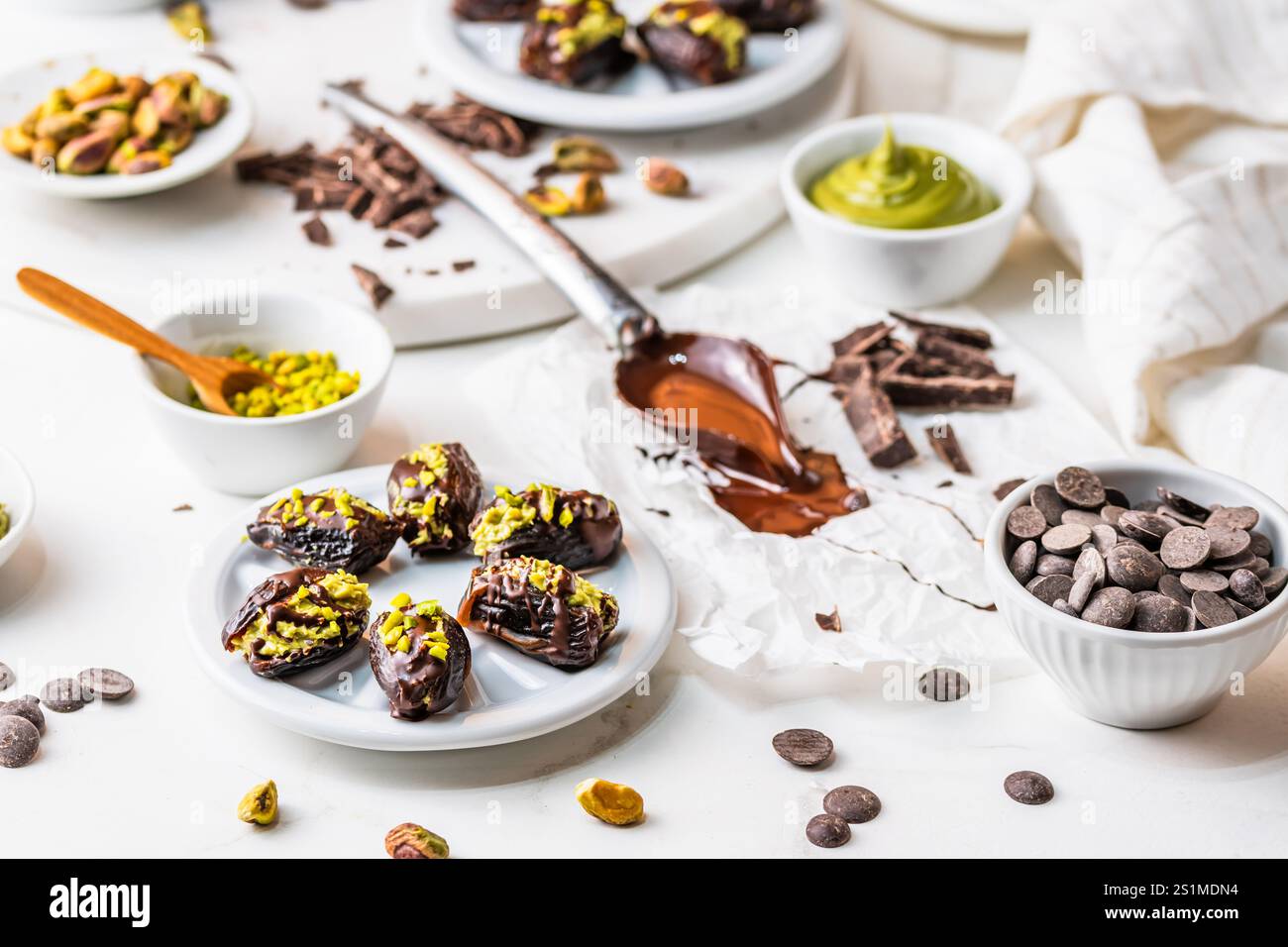 Dates filled with crunchy pistachio cream and covered in chocolate ...