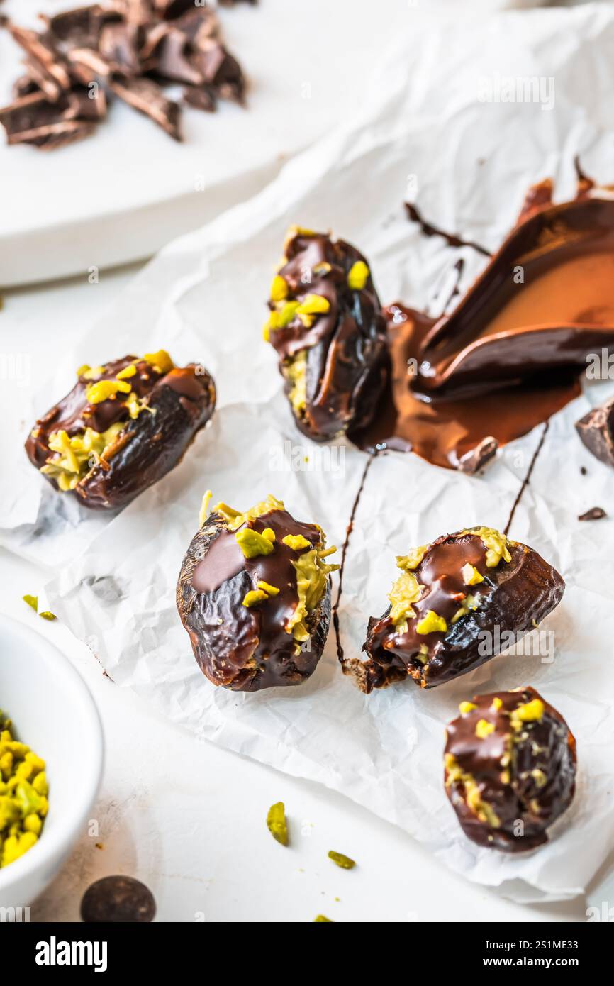 Dates filled with crunchy pistachio cream and covered in chocolate ...