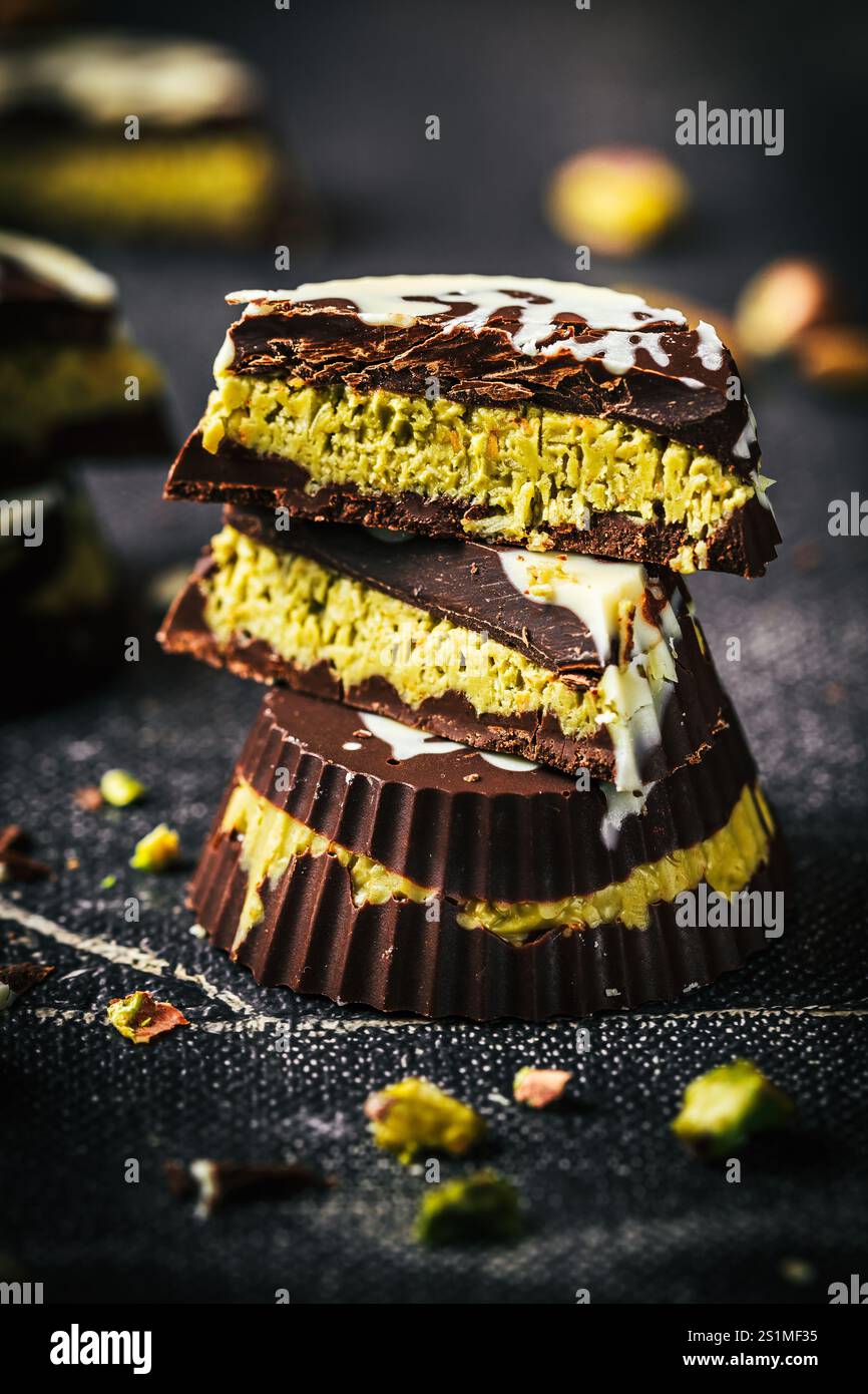 Trendy homemade Dubai chocolate pralines, chocolate filled with crunchy ...