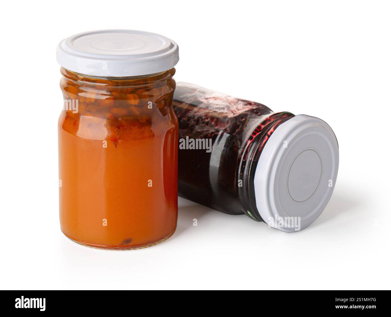 Two jars of fruity jams isolated on white background with clipping path ...