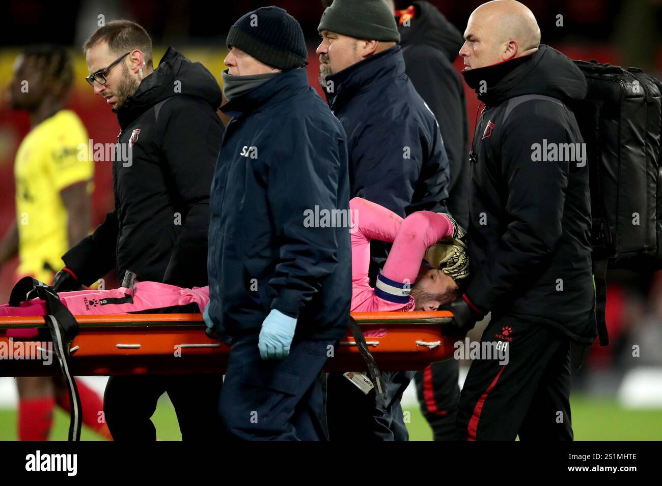 Watford goalkeeper Daniel Bachmann is stretchered off after being ...