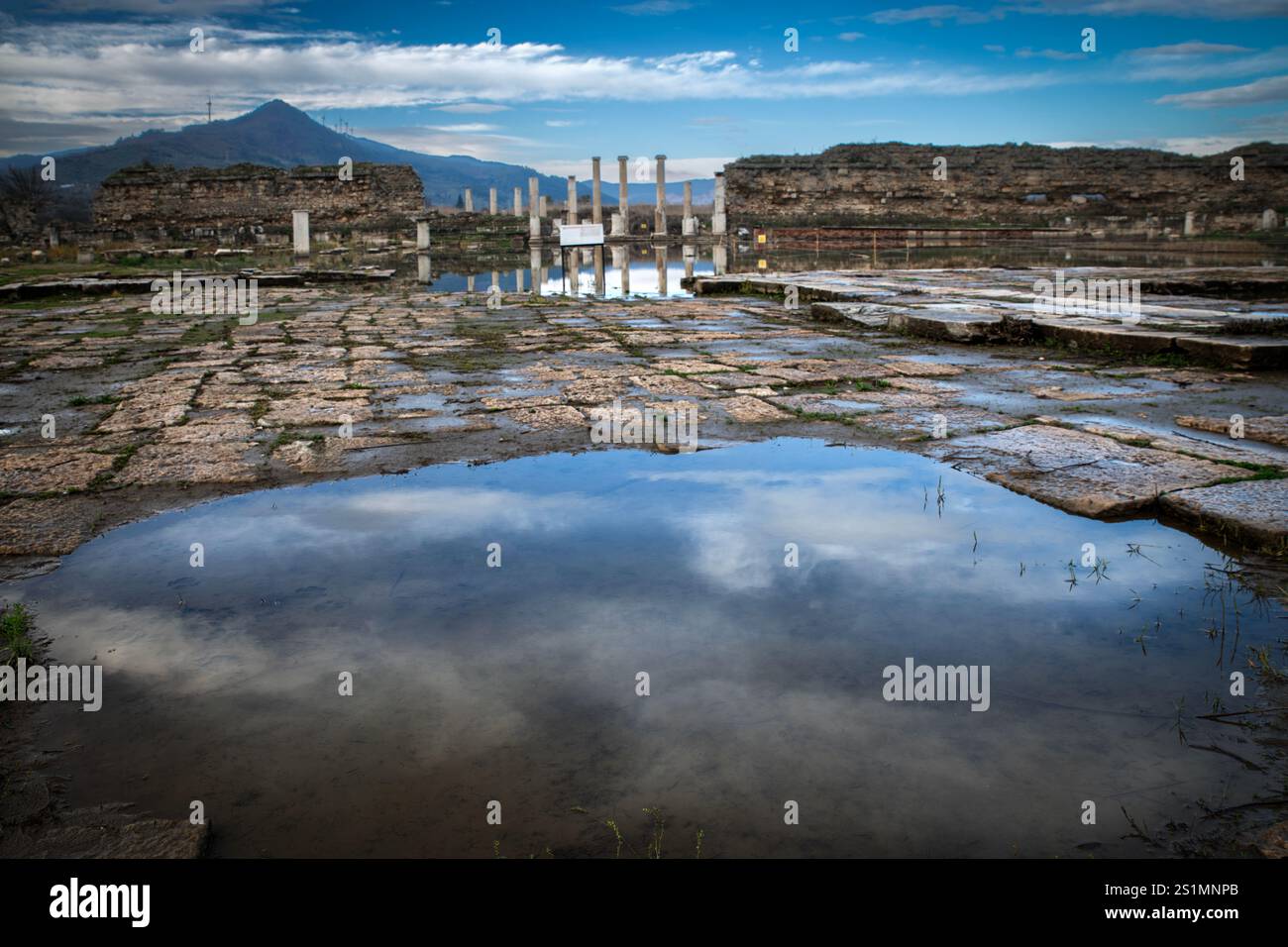 Reflection and ancient columns in the ancient city of Magnesia Stock ...
