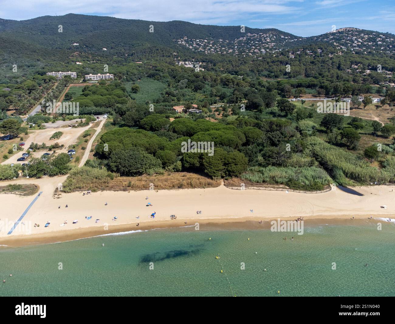 Aerial view on boats, crystal clear blue water of Plage du Debarquement ...