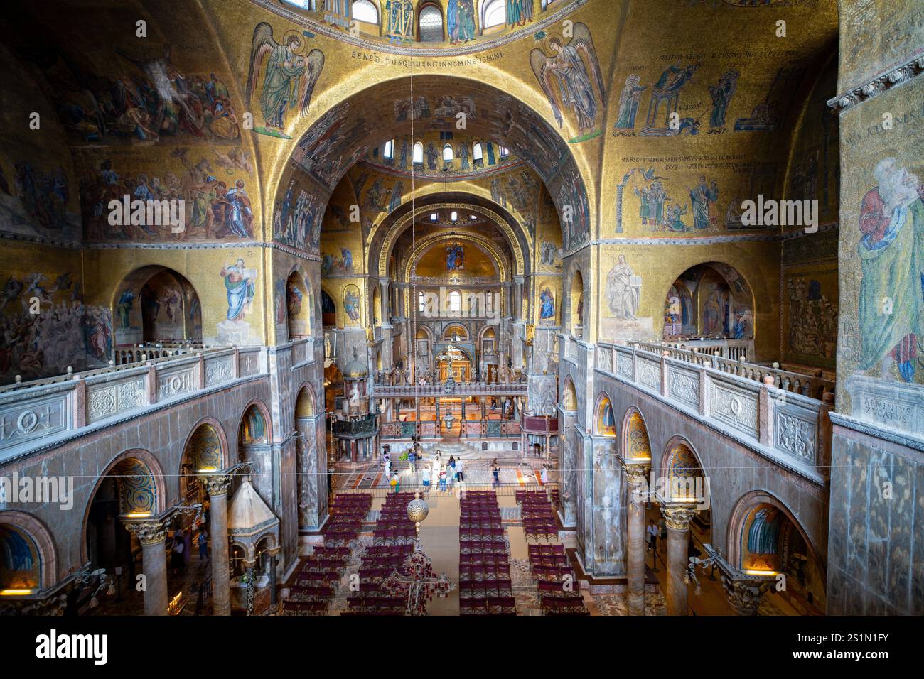 The ornate interior of St. Mark's Basilica in Venice, Italy, features ...