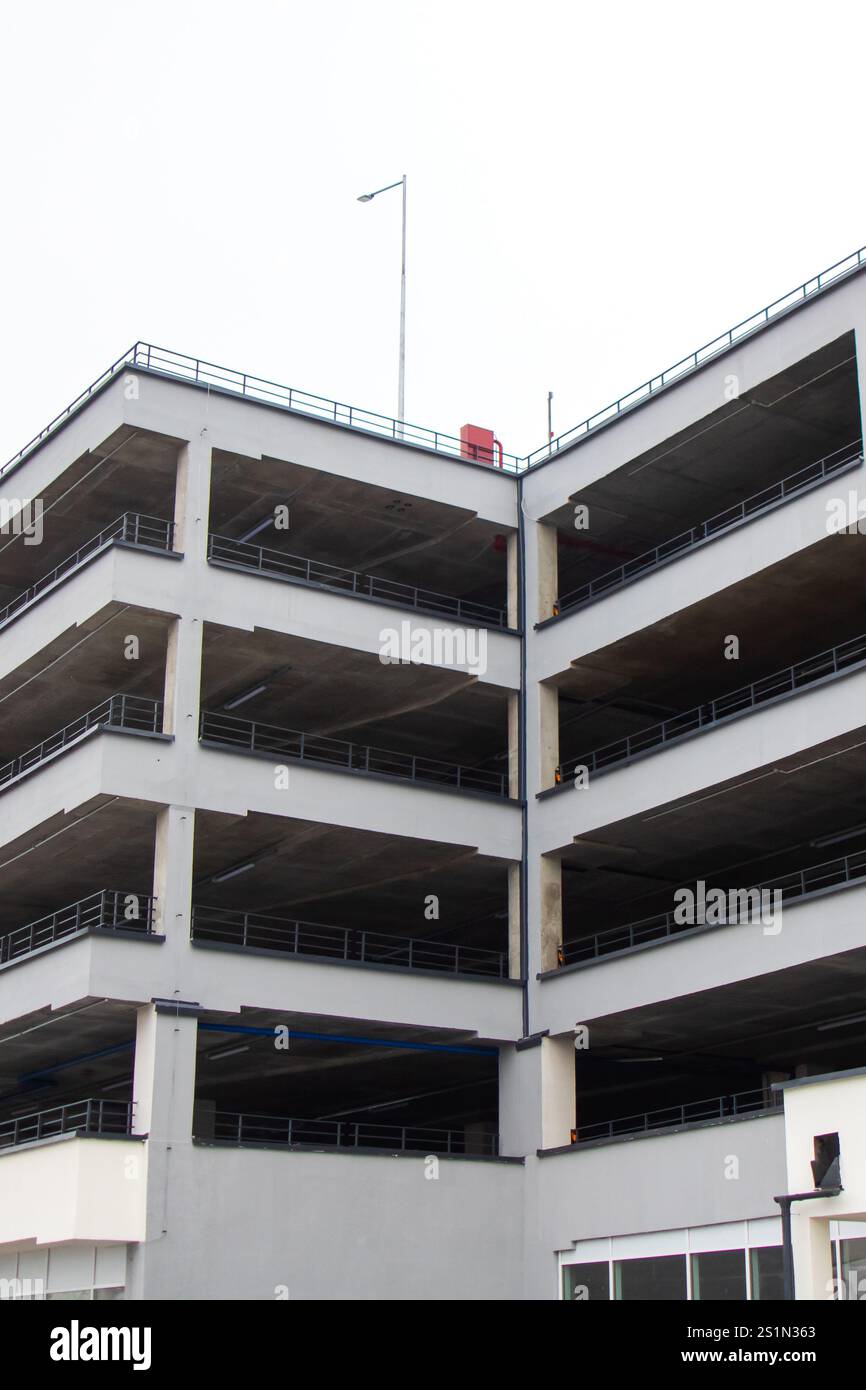 A remarkably tall and striking building featuring numerous levels and ...