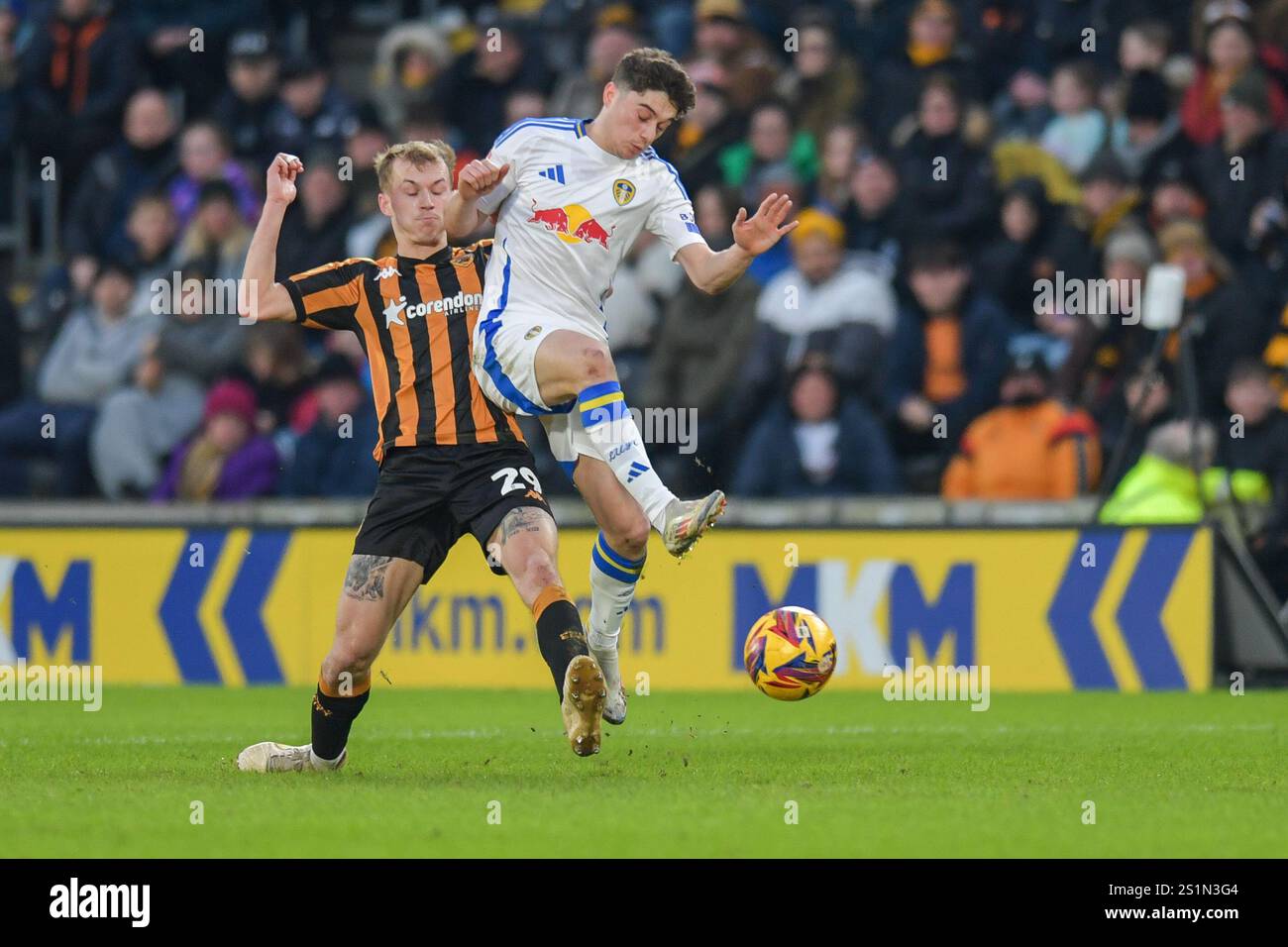 Leeds United's Daniel James nips in to take the ball before Hull City's ...