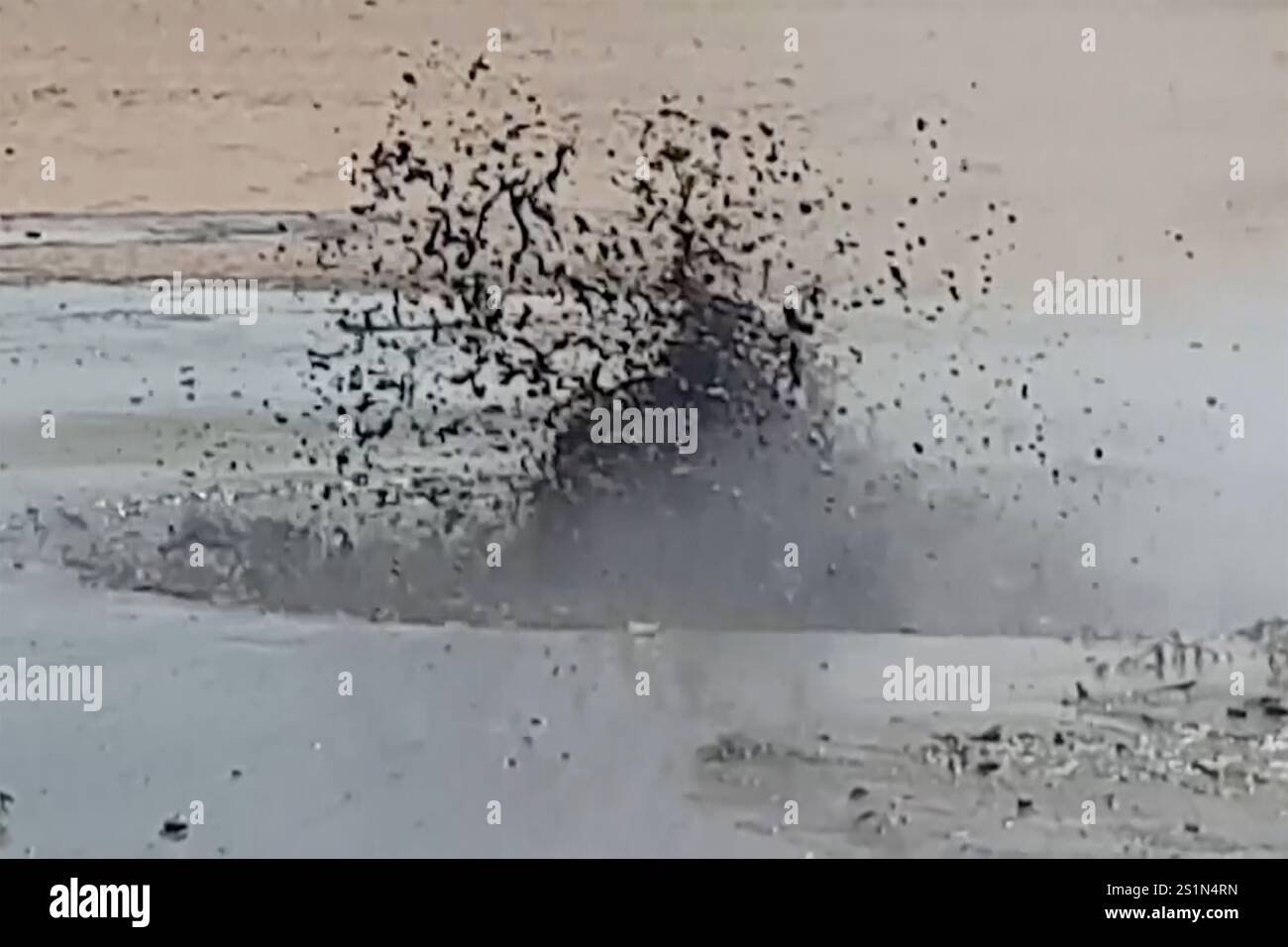 In this image taken from video, mud bubbles up near volcanic activity ...