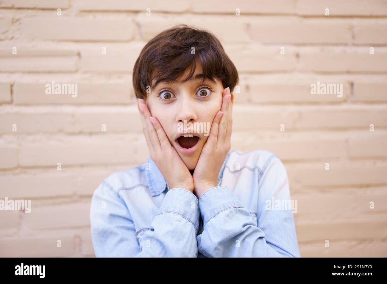 A Surprised Young Girl Expressing Her Excitement with Genuine Emotion ...