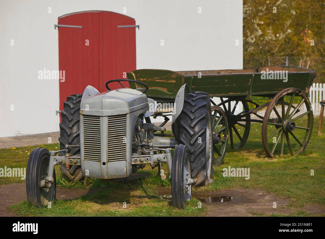 Vintage tractor and cart at the ranch in Denmark Stock Photo - Alamy