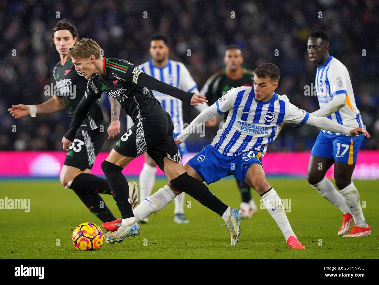 Arsenal's Martin Odegaard (left) and Brighton and Hove Albion's Yasin ...