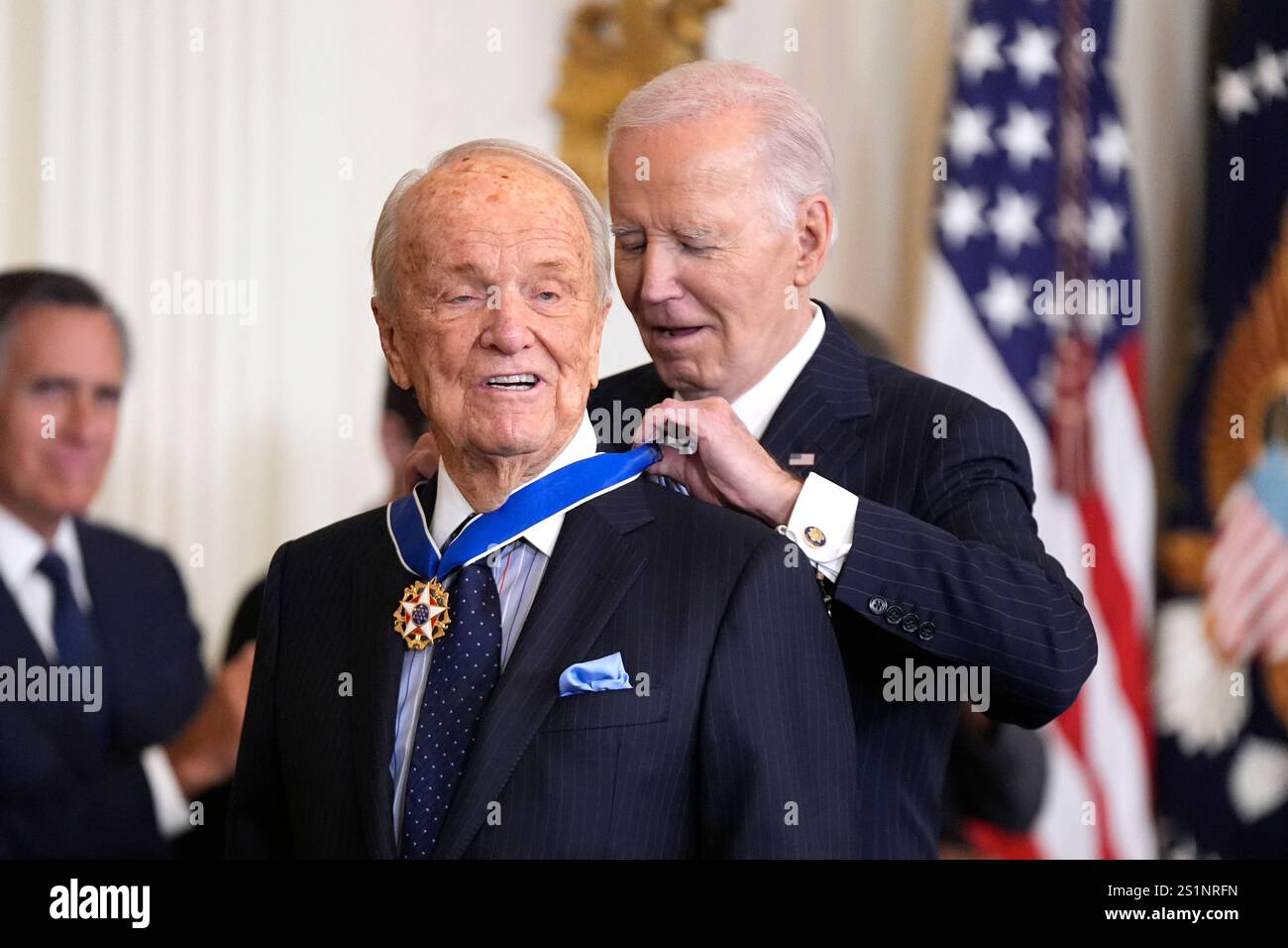 President Joe Biden, right, presents the Presidential Medal of Freedom ...