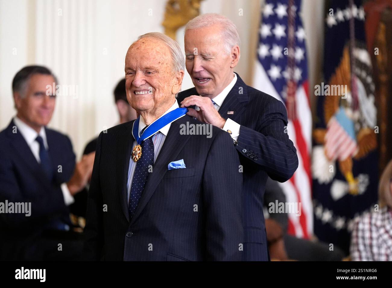 President Joe Biden, right, presents the Presidential Medal of Freedom ...