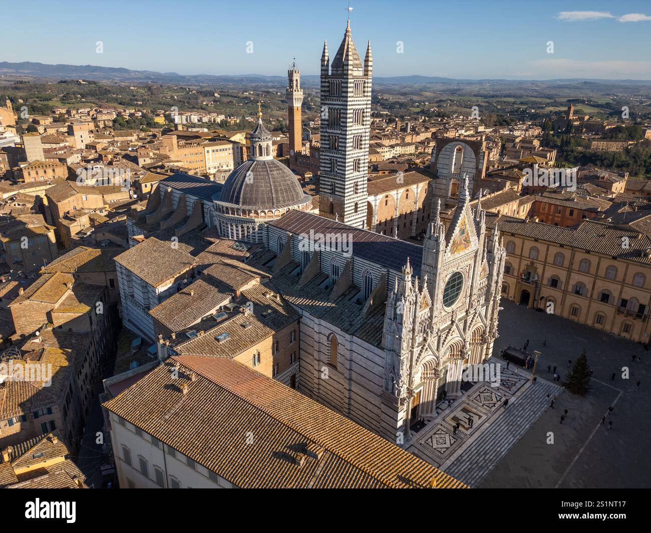 This aerial drone photo shows the historical town center of Siena in Tuscany, Italy. Siena is ...