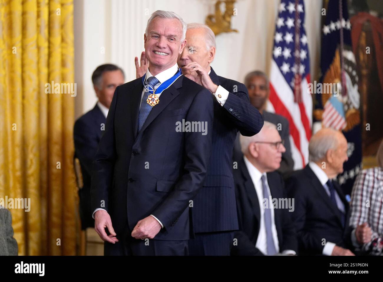 President Joe Biden, right, presents the Presidential Medal of Freedom, the Nation's highest ...