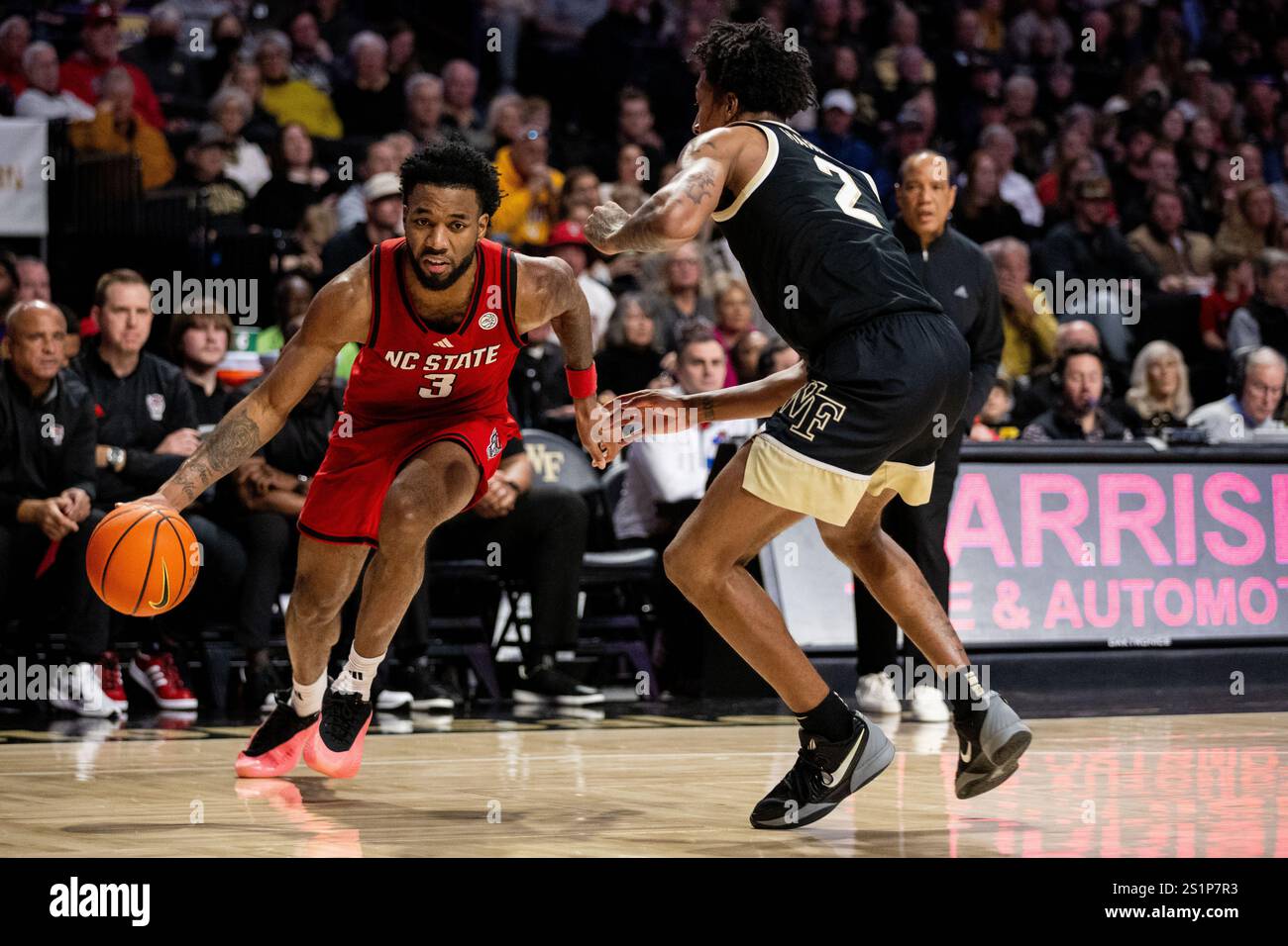 Winston-Salem, NC, USA. 4th Jan, 2025. North Carolina State guard ...