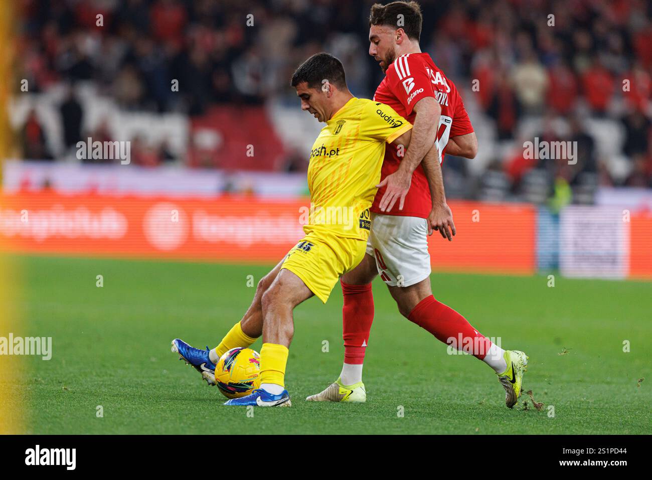 Lisbon, Portugal. 4th Jan 2025. Victor Gomez (SC Braga), Orkun Kokcu ...