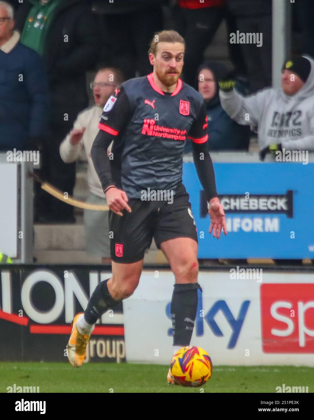 Burton Upon Trent, UK. 4th Jan, 2025. Tom Eaves of Northampton Town in ...