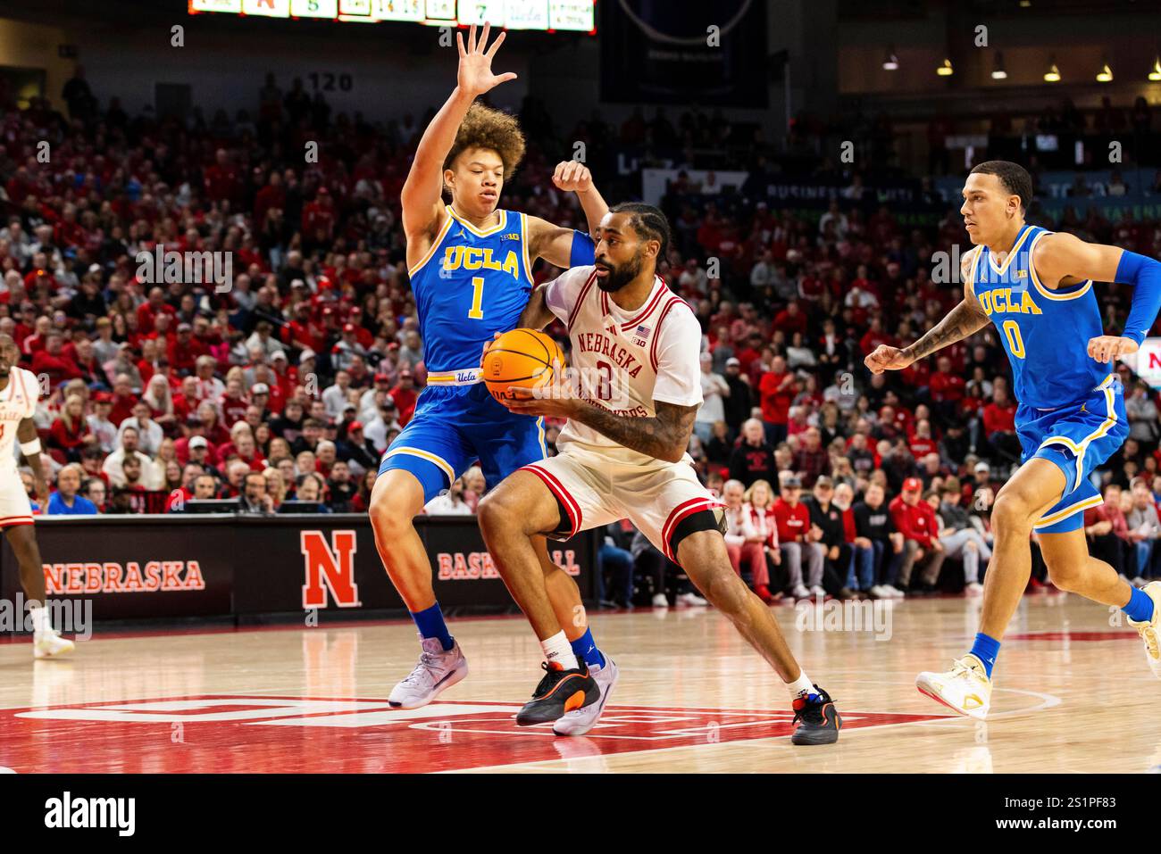 Nebraska guard Brice Williams (3) drives past UCLA guard Trent Perry (1 ...