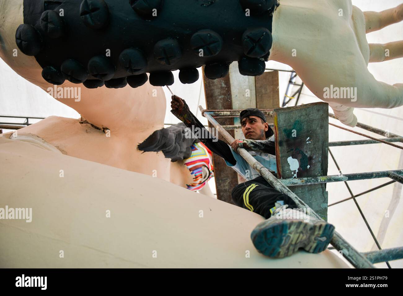 Artisans finish last touches like paint, welding and assembly of the ...