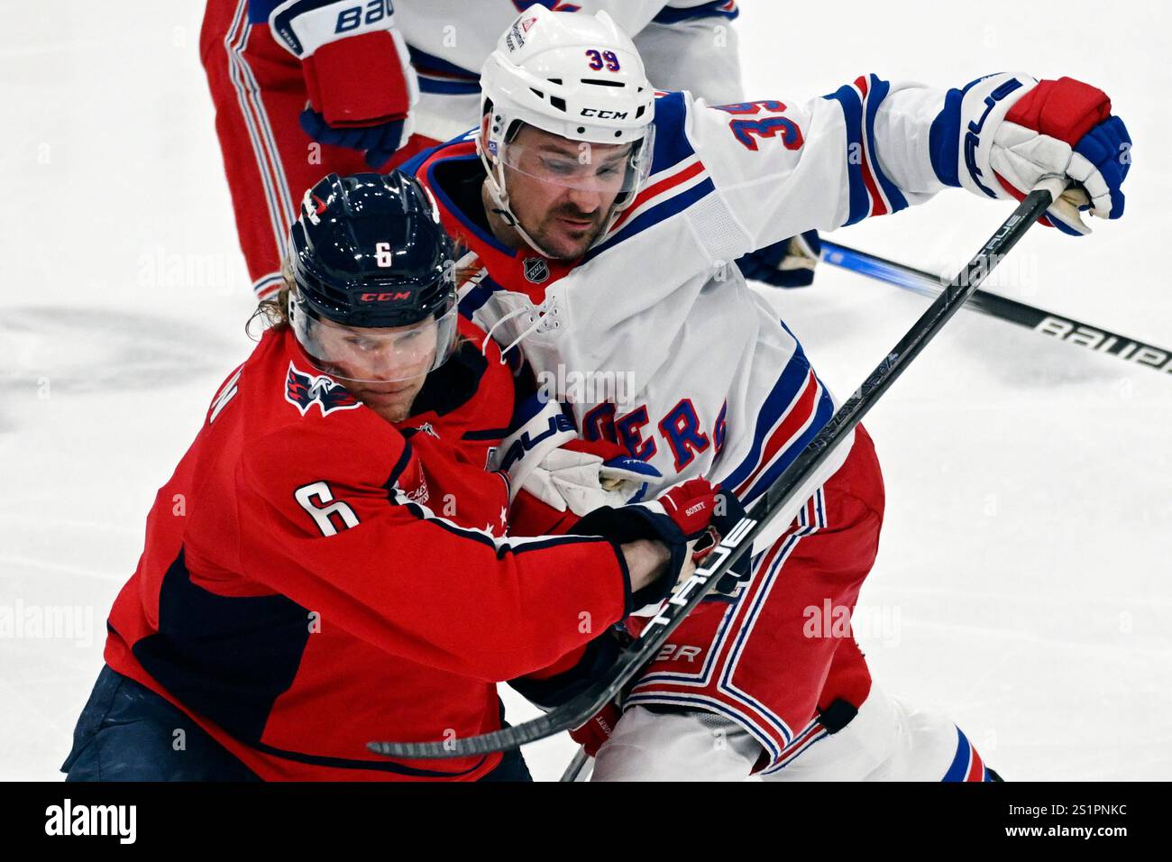 Washington Capitals defenseman Jakob Chychrun (6) collides with New ...