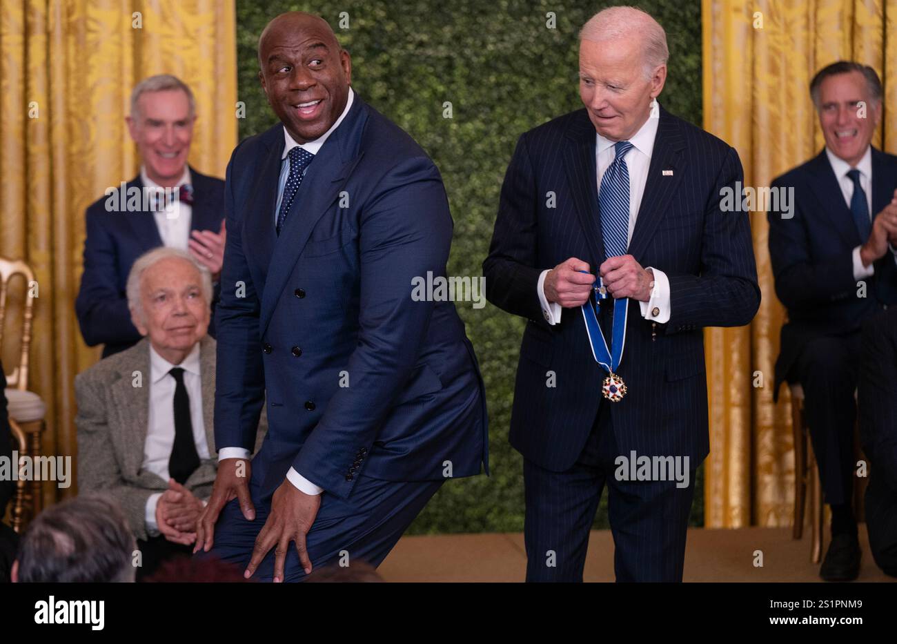 President Joe Biden presents retired athlete, philanthropist, and ...