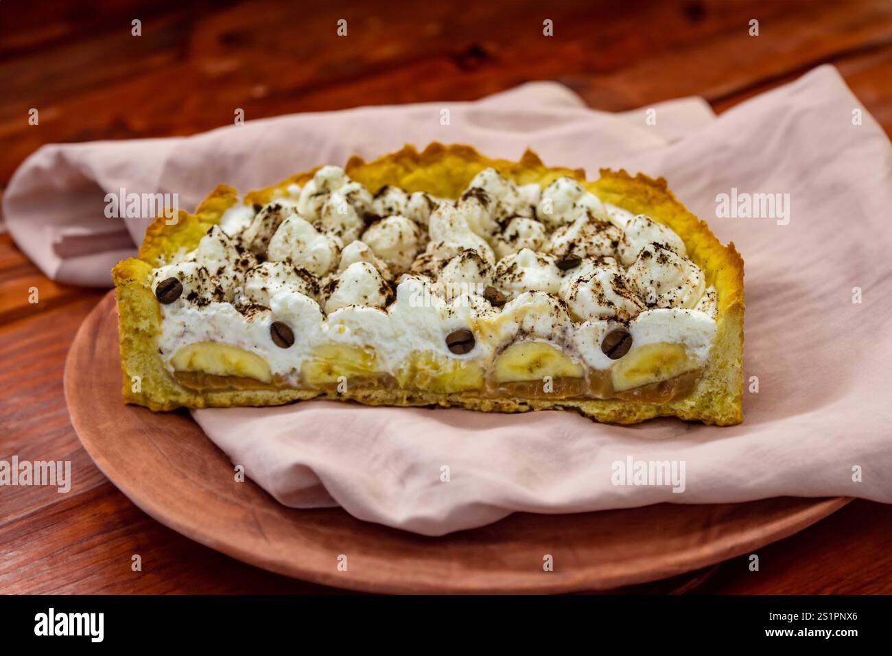 Traditional banoffee cake with banana and caramel sauce filling ...