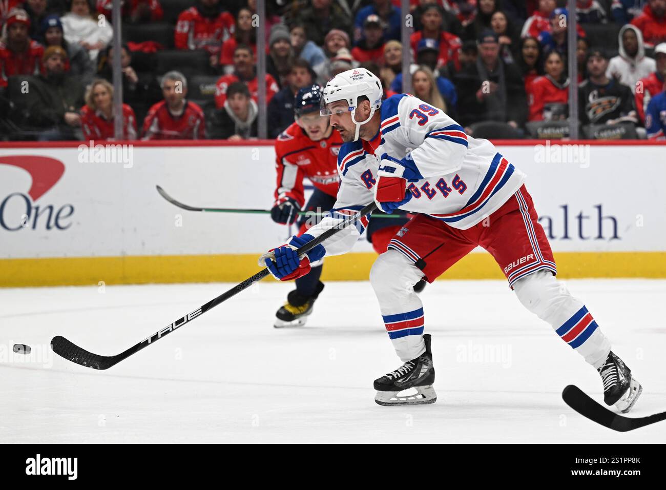 New York Rangers center Sam Carrick (39) scores a goal during the ...