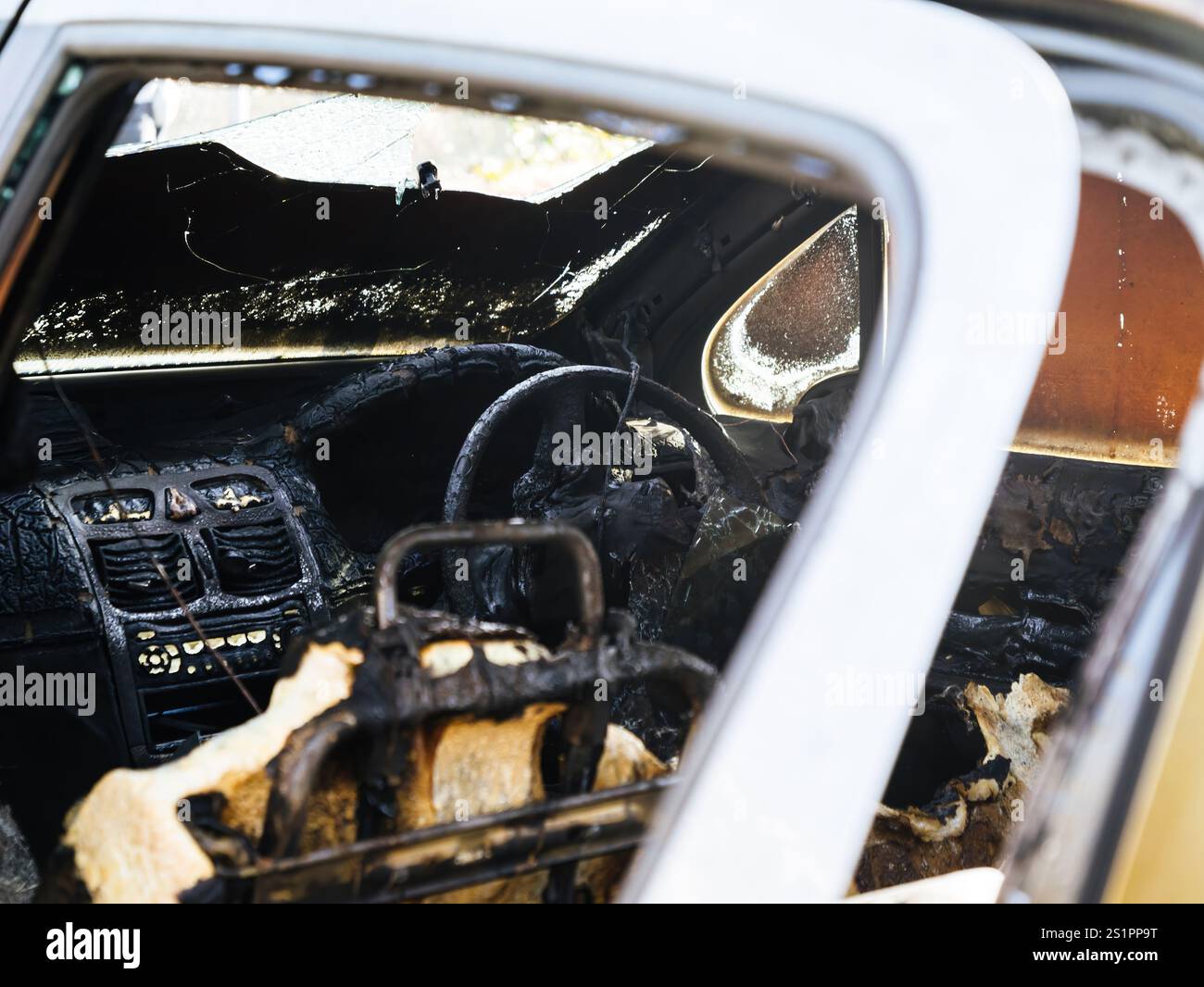 The interior of a heavily burned car in the Vauban neighborhood of ...