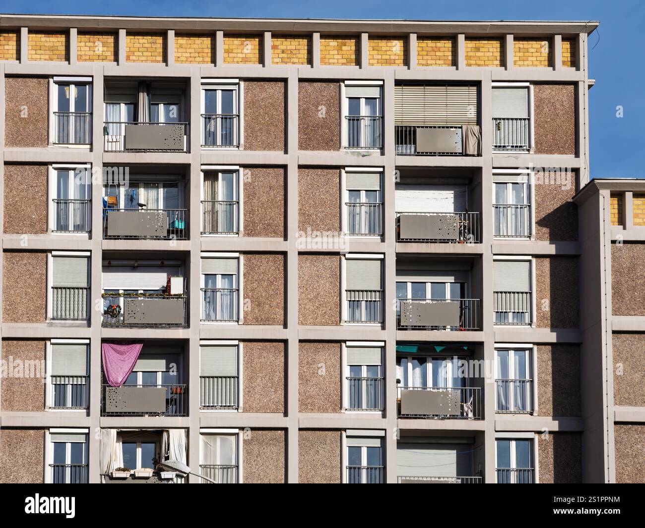 A close-up view of the facade of a residential building in Cite ...