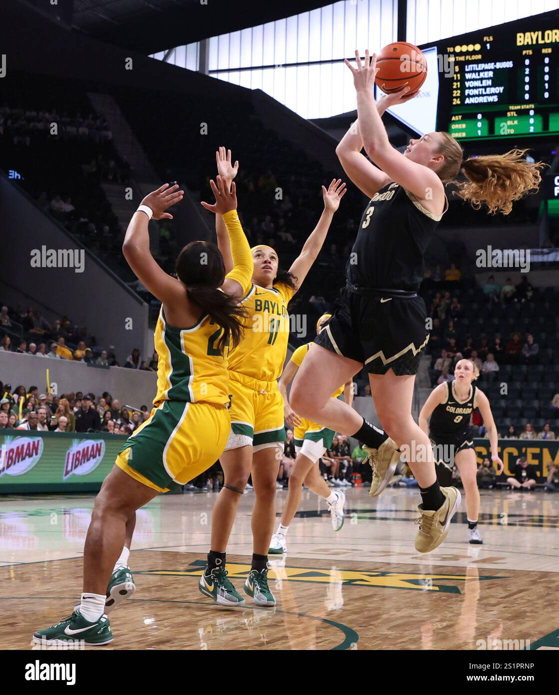 Colorado guard Frida Formann scores over Baylor guard Sarah Andrews ...