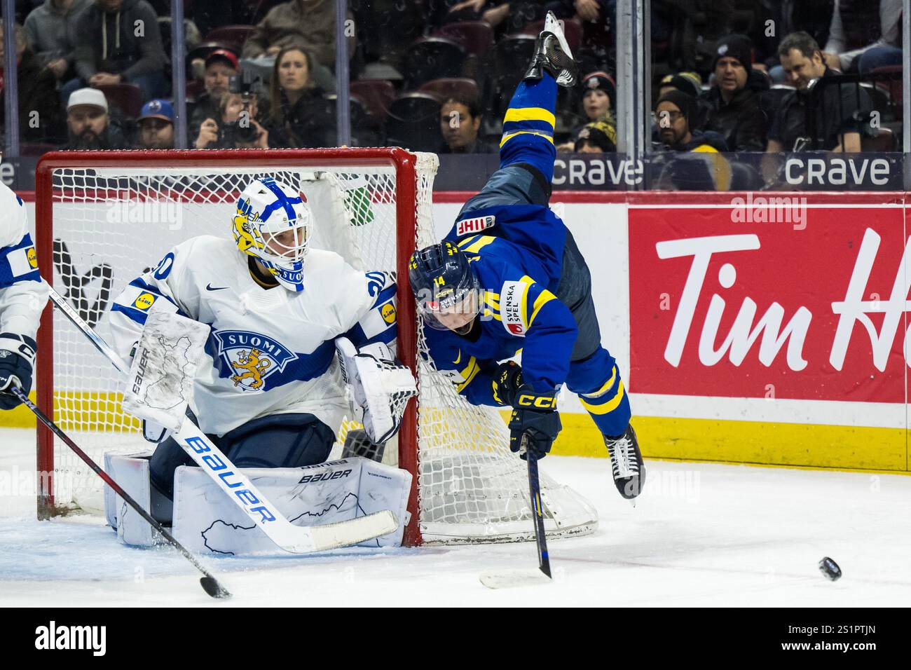 Goaltender Petteri Rimpinen of, Finland. , . and Linus Eriksson of ...