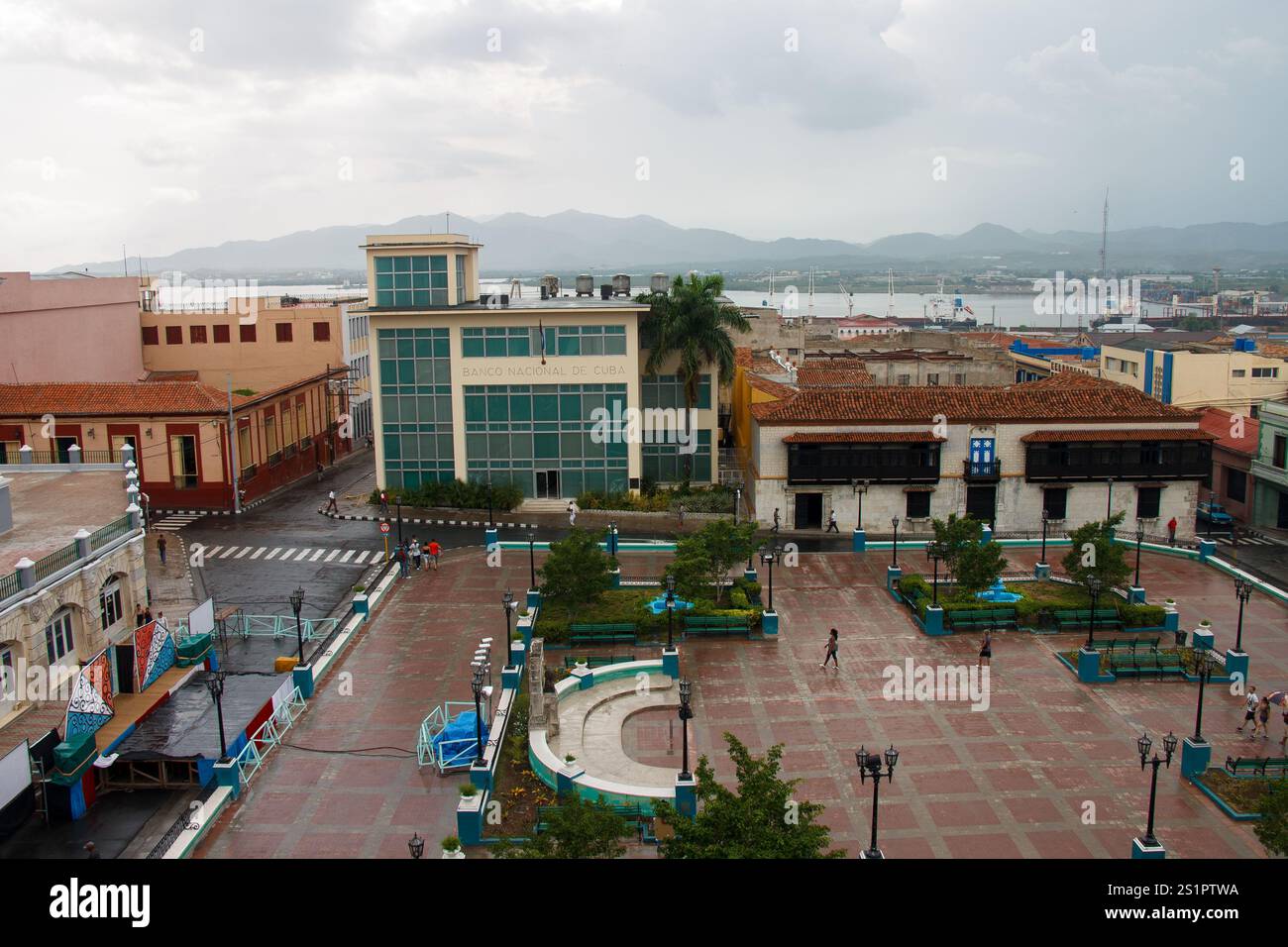 The Parque Cespedes lively plaza with colonial architecture and Diego ...