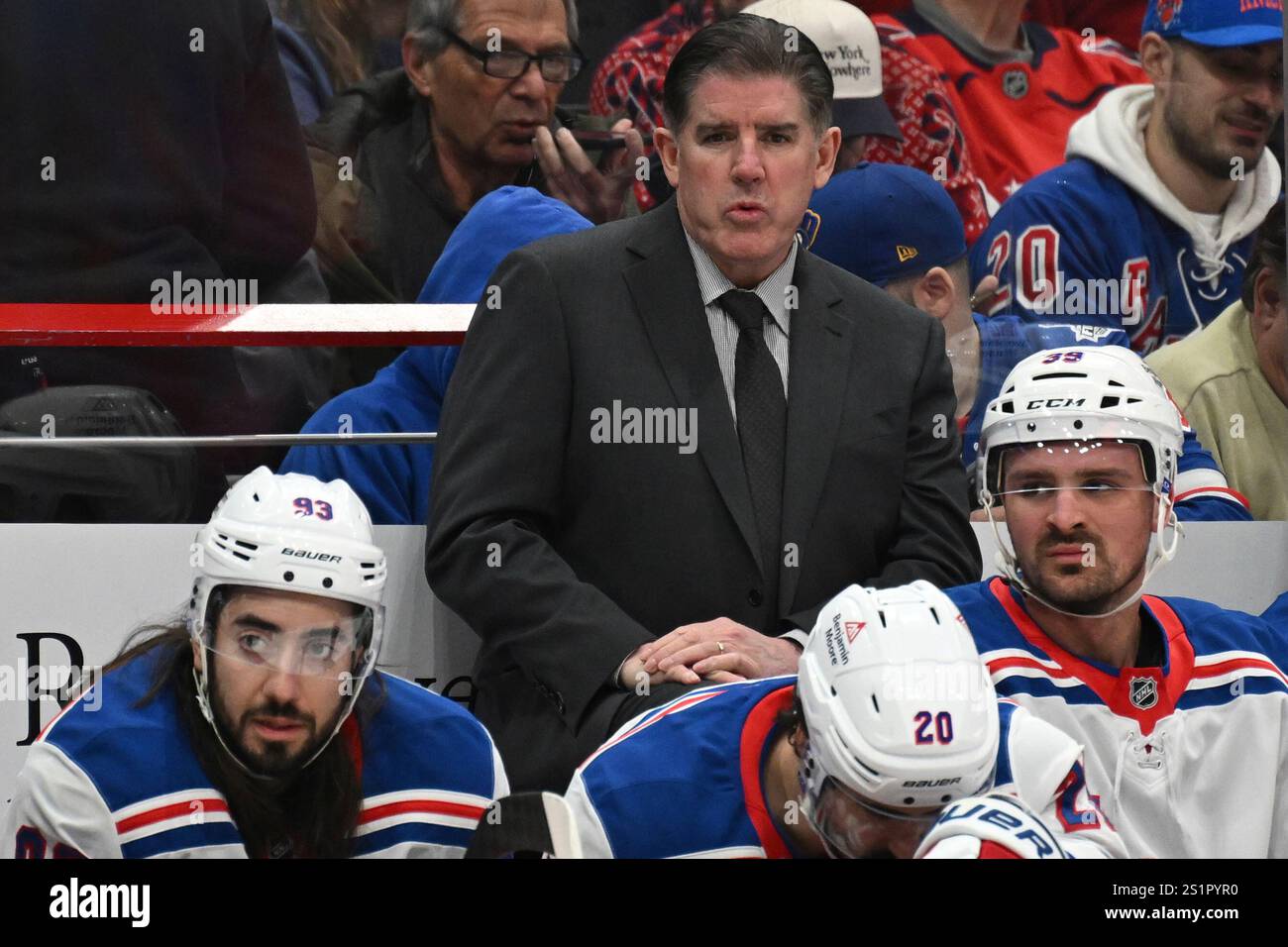New York Rangers head coach Peter Laviolette watches from the bench ...
