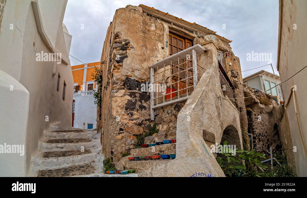 Rustic Mediterranean Alleyway Featuring Stone Staircase and Quaint ...