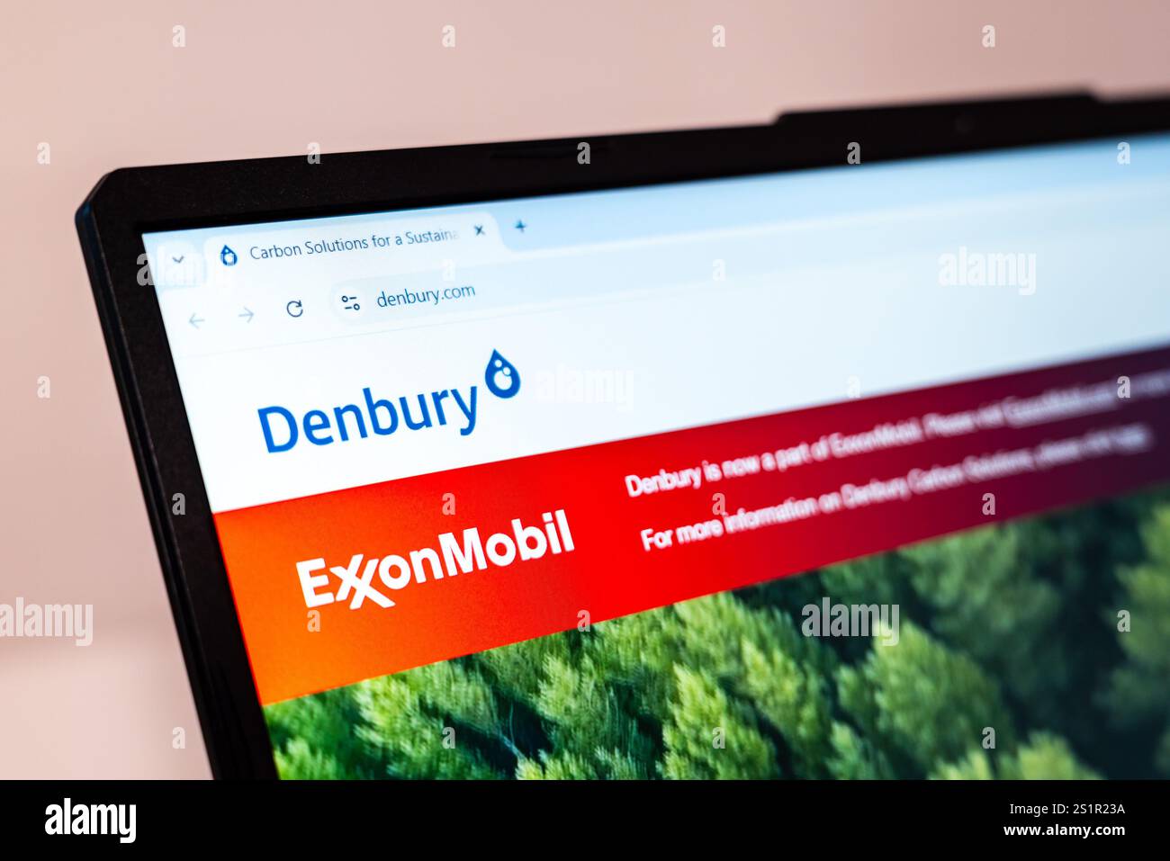 New York, USA - January 01, 2025: Denbury and ExxonMobil website on ...