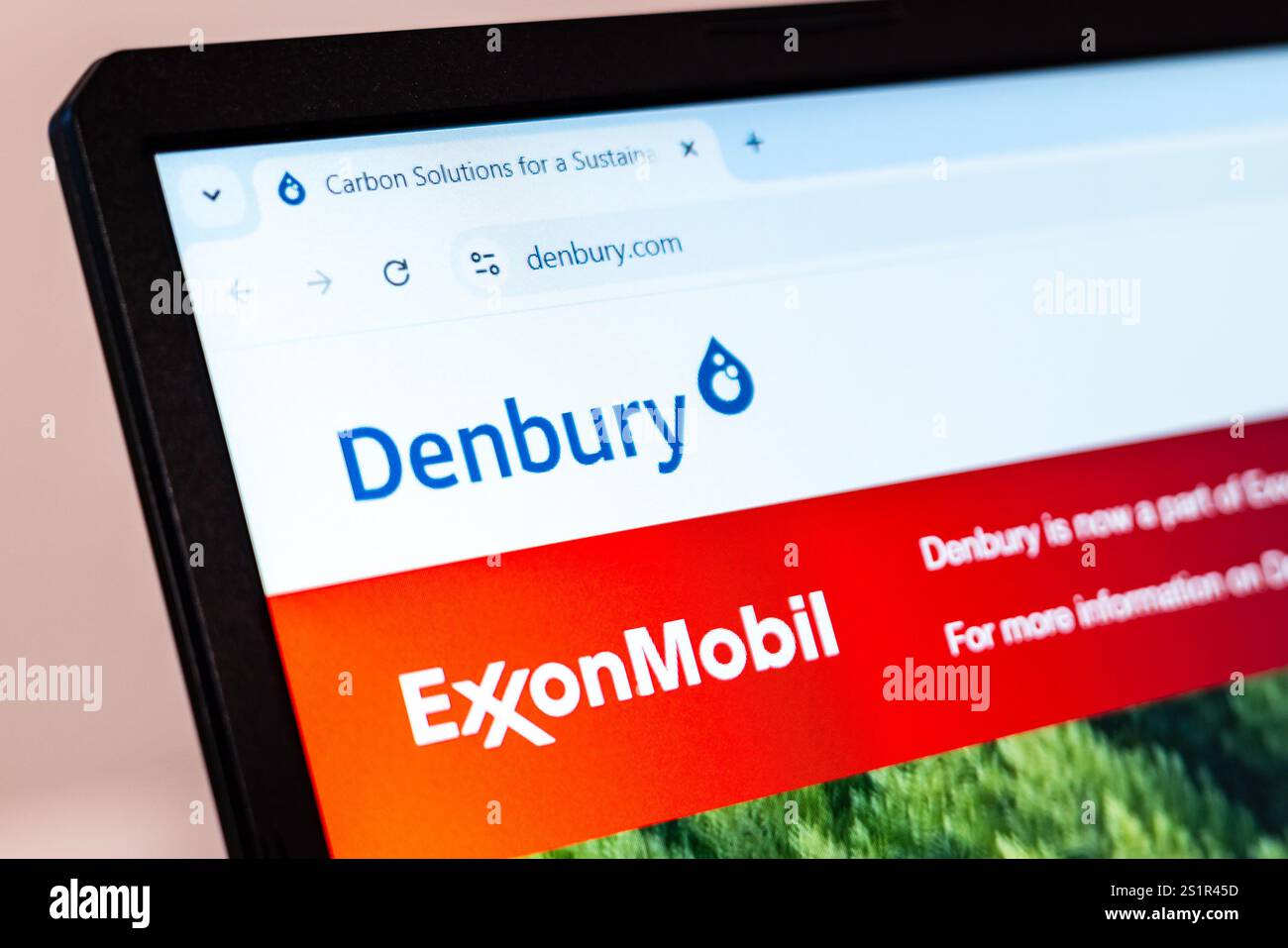 New York, USA - January 01, 2025: Denbury and ExxonMobil website on ...